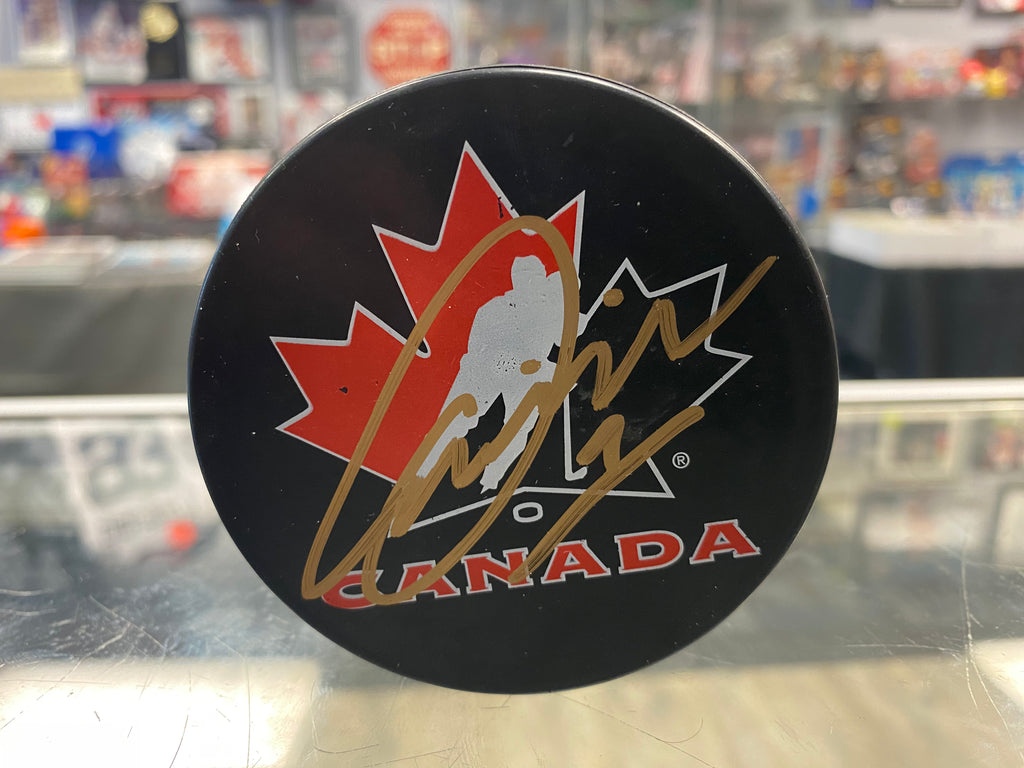 Thomas Milic signed Team Canada Hockey Puck – First Row Collectibles